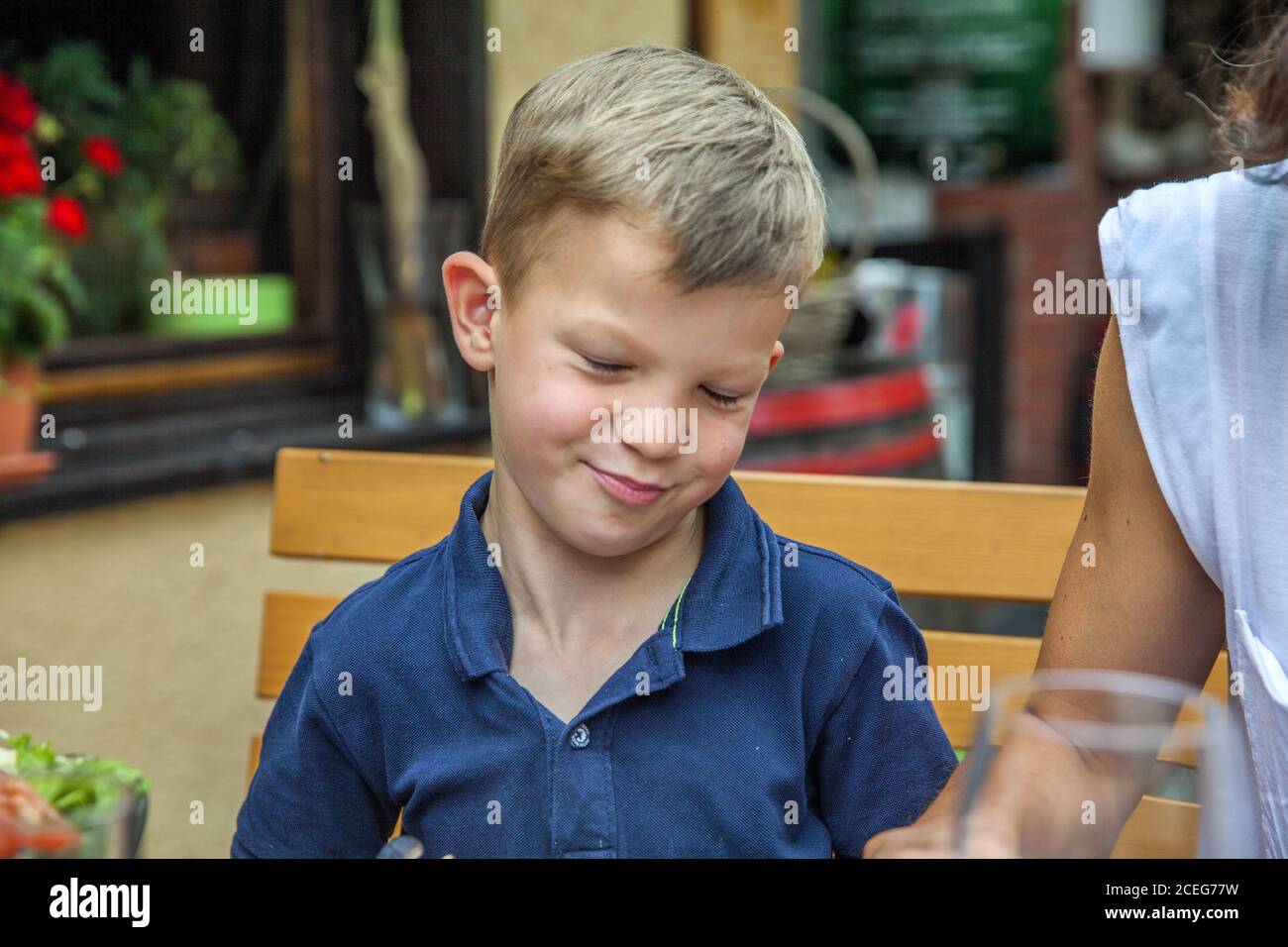 Cute child with a funny face expression Stock Photo - Alamy