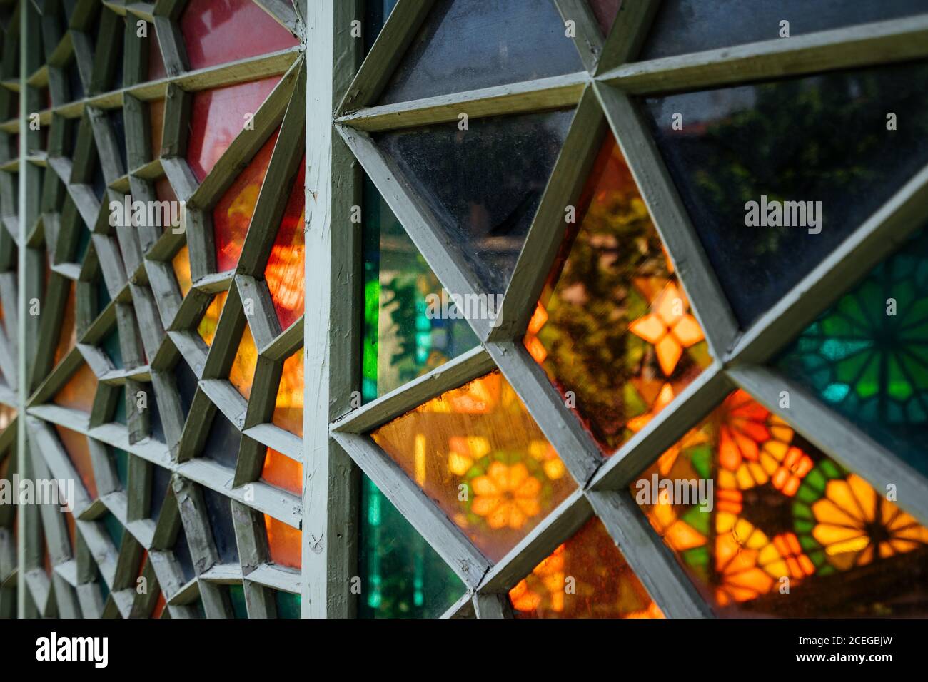 Close-up outdoors view of old elegant vintage leaded window panel in ...