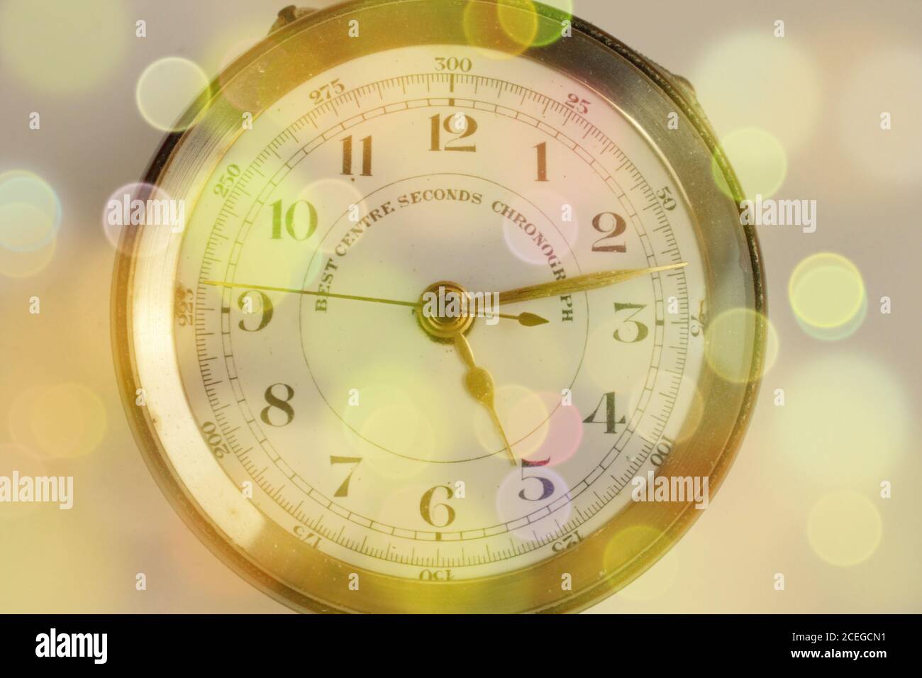 Pocket watch face with golden shades with bokeh effect Stock Photo - Alamy