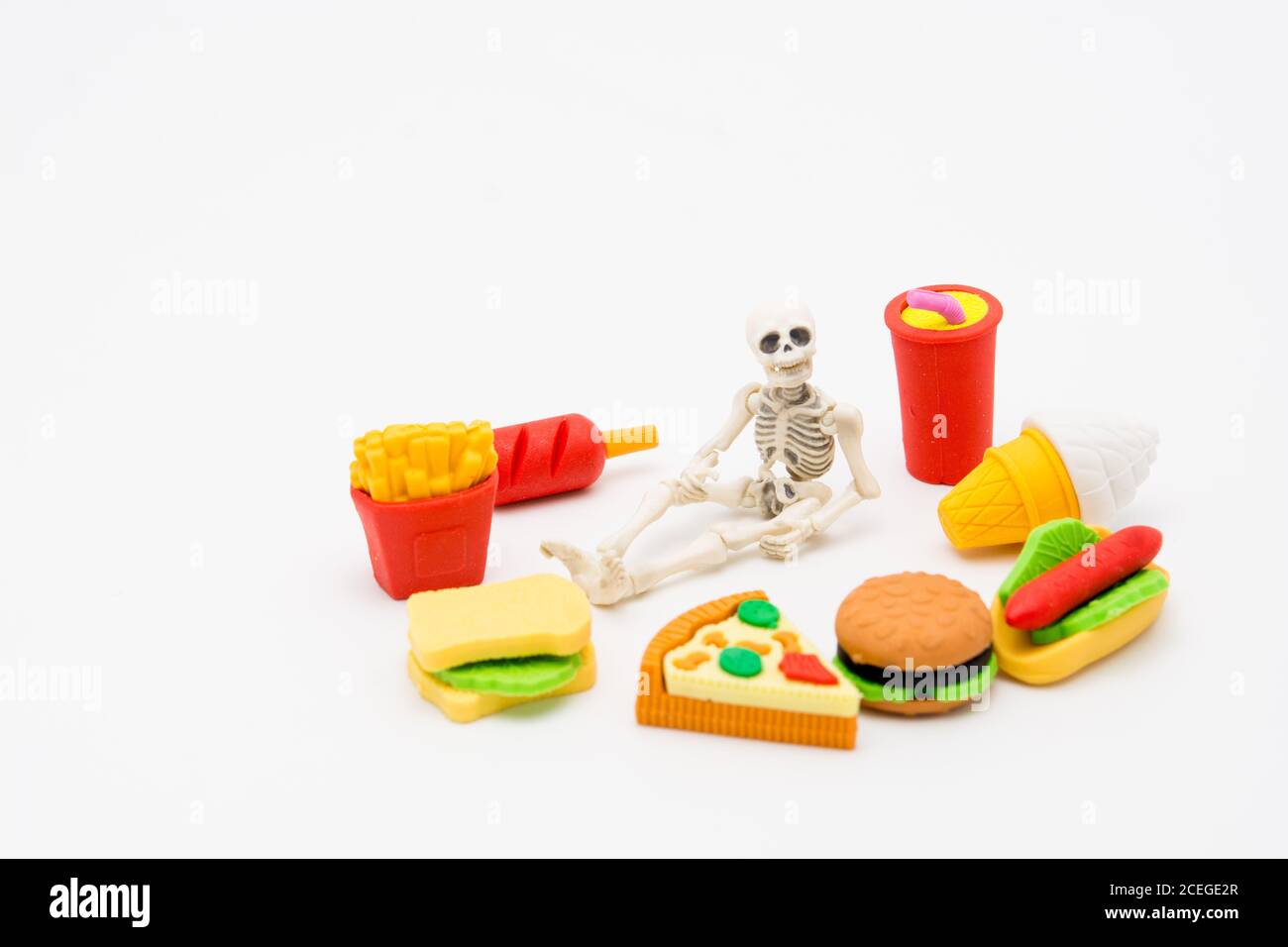 Skeleton and foods, enjoy eating until death with junk foods Stock ...