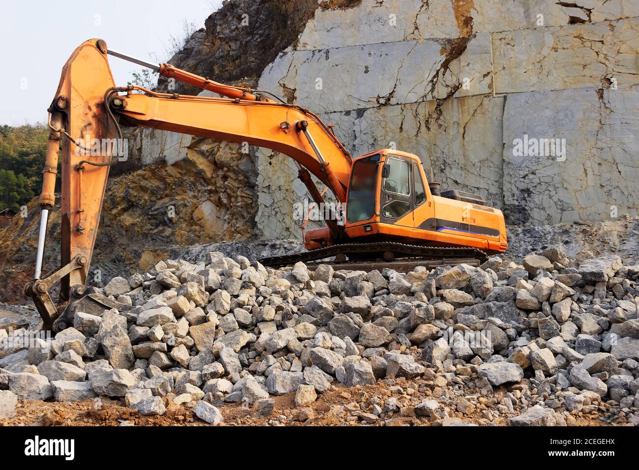 Breaker used to break up boulders in open cast mine. Mining in southern ...
