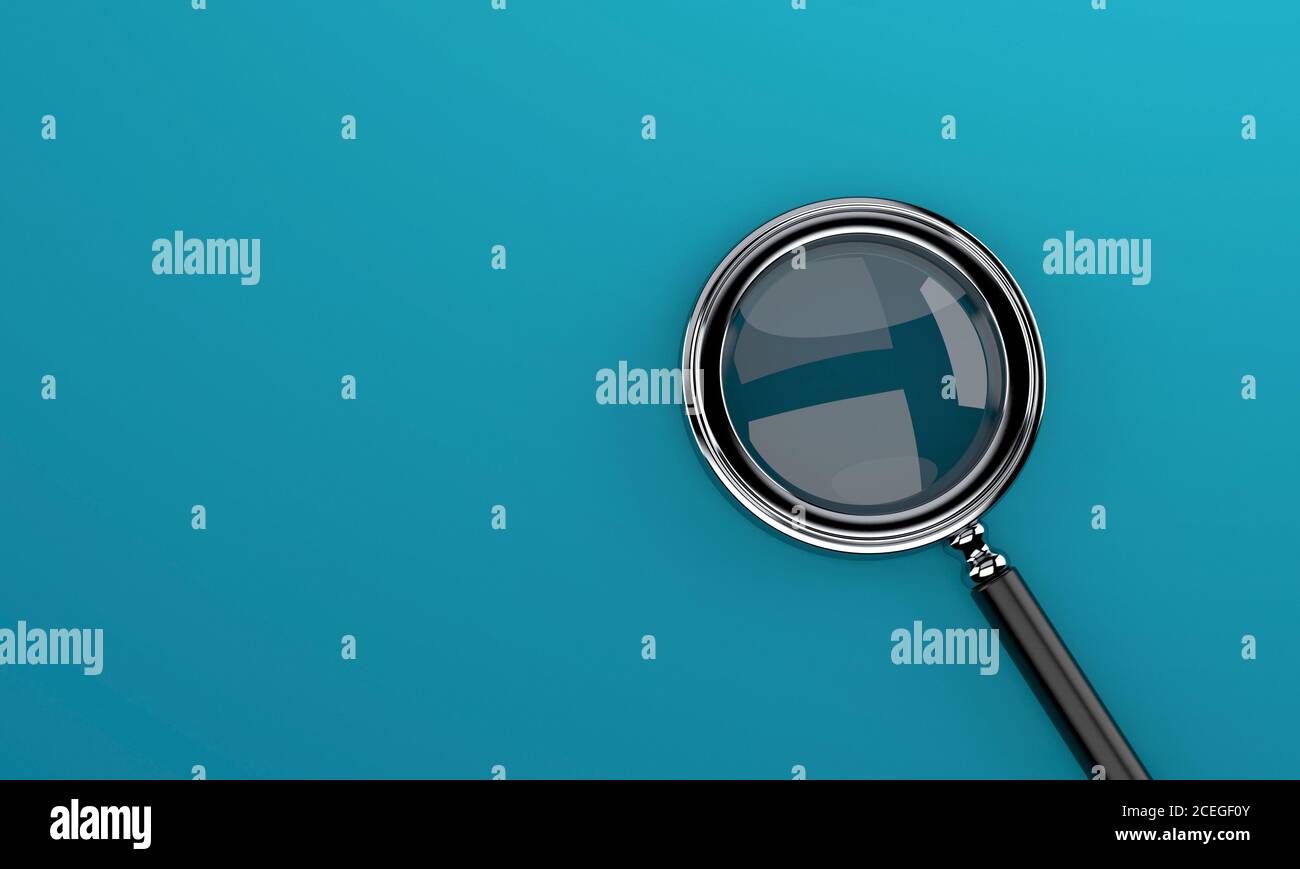 Magnifying glass lying on blue background Stock Photo - Alamy