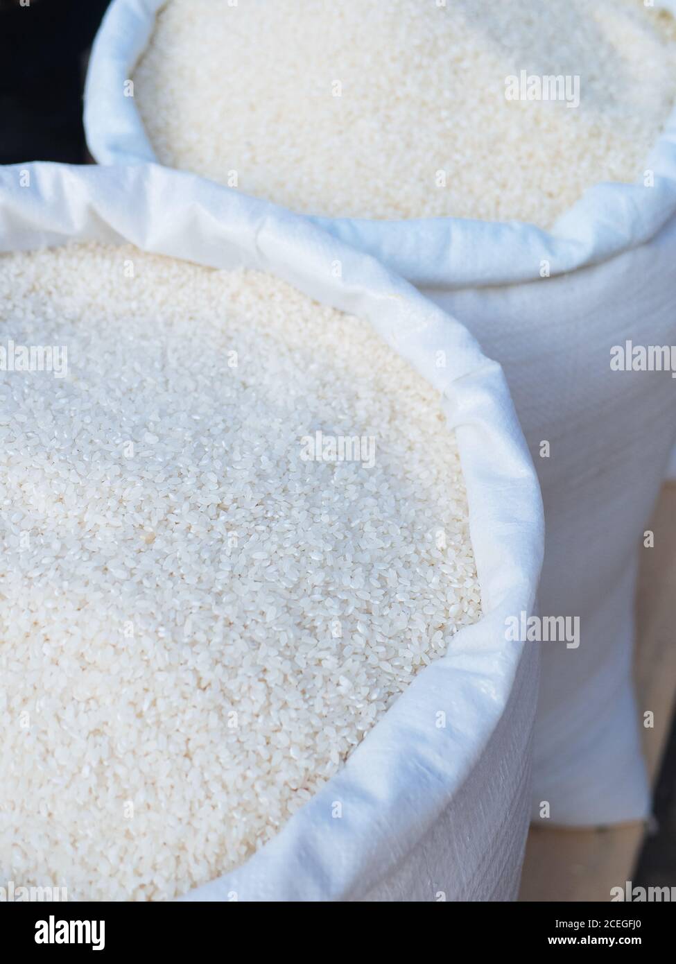 Fabric bags of rice Stock Photo - Alamy