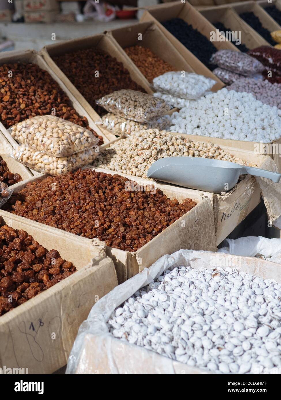 fabric bags filled with various grains and aromatic spices and ...