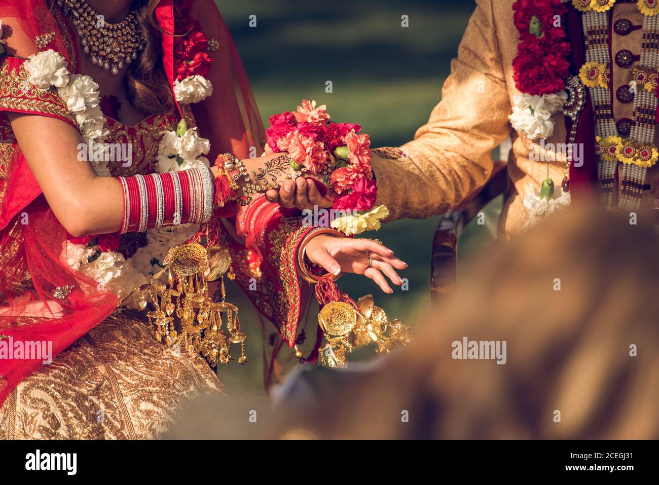 Crop Hindu bride and groom Stock Photo - Alamy