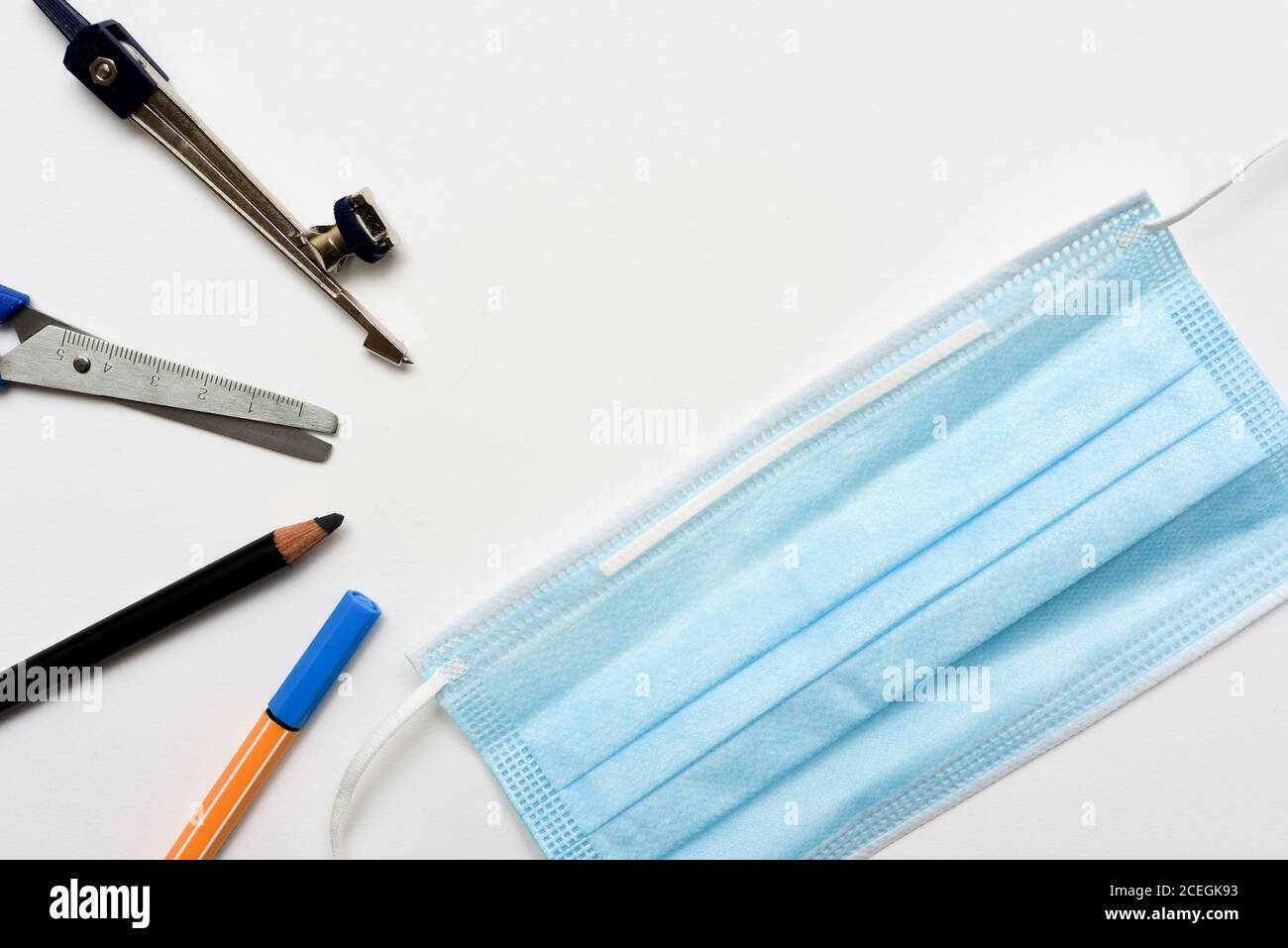 Back to school stationary with face mask to prevent spread of virus and ...