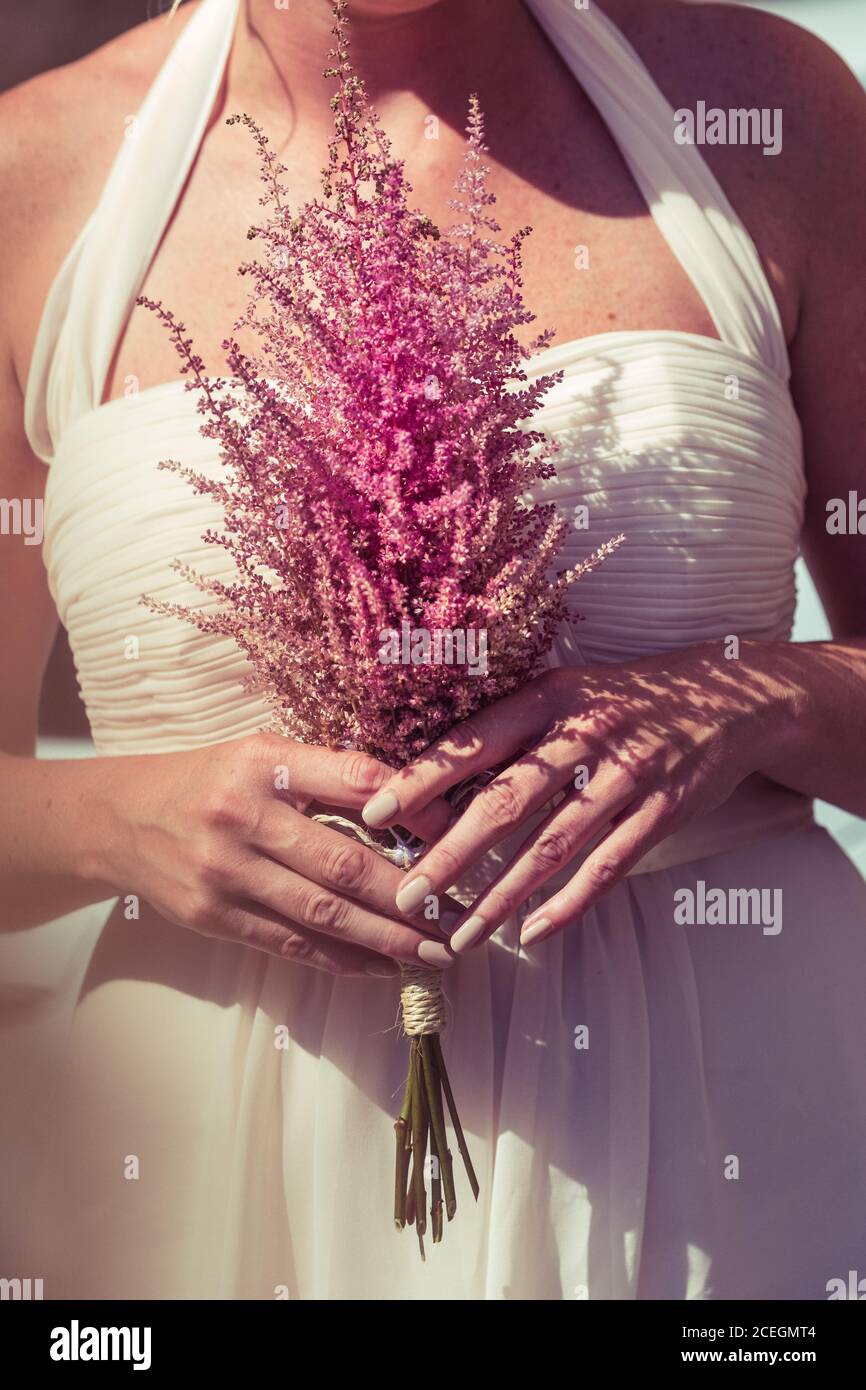 Fiancee holding wedding bouquet hi-res stock photography and images - Alamy