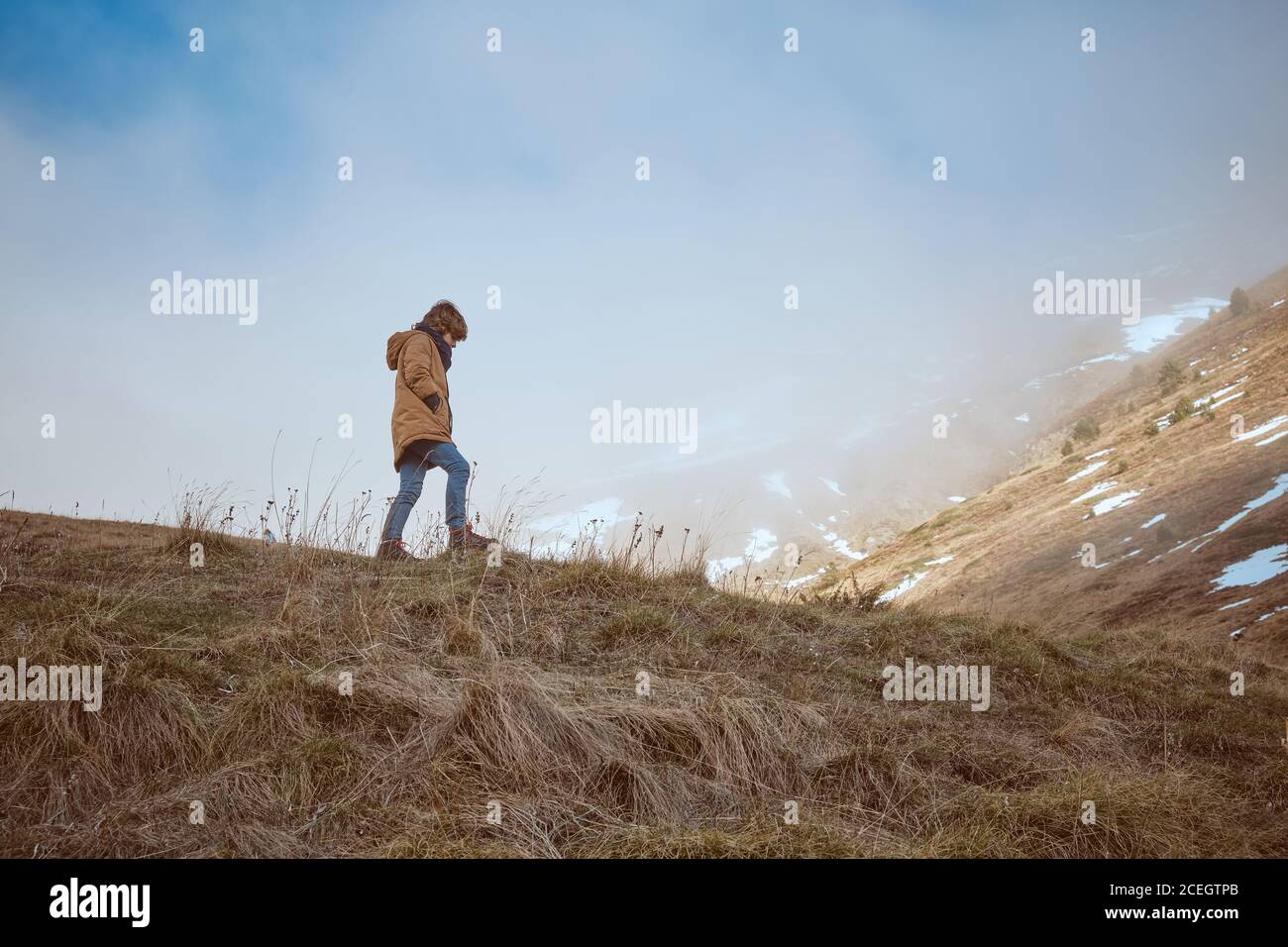 Kid standing in grass hi-res stock photography and images - Alamy
