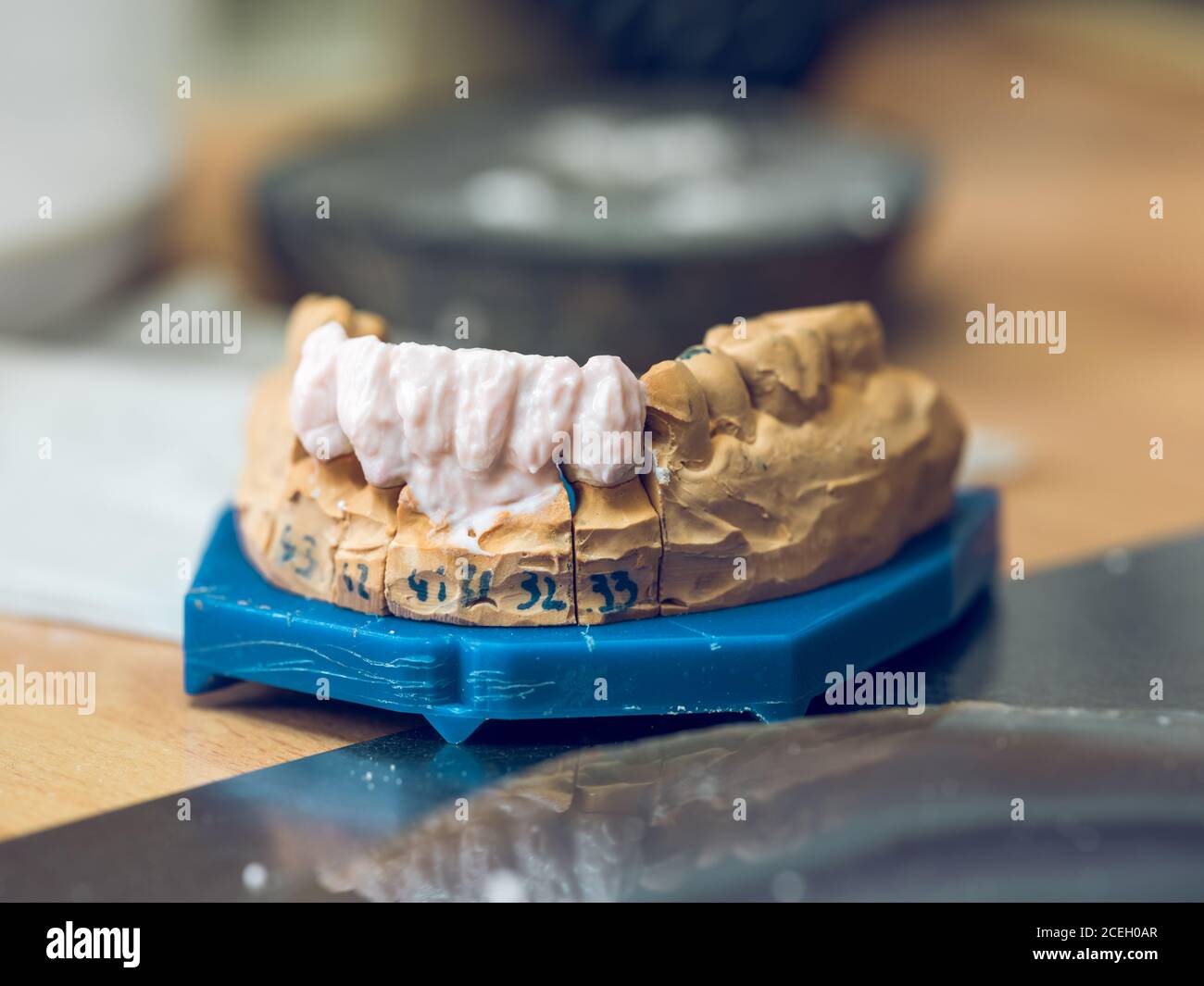 Table manufacturing artificial teeth hi-res stock photography and ...