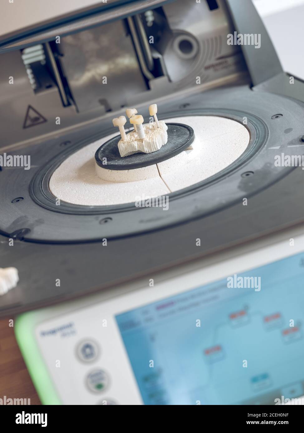 Tooth making machine in lab Stock Photo - Alamy
