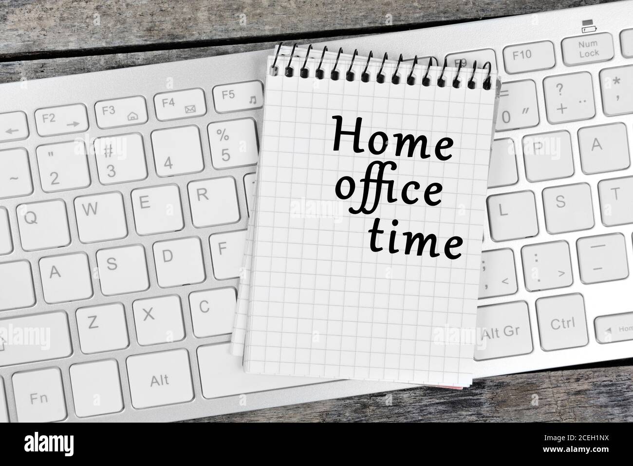 Home office time word on notebook page Stock Photo - Alamy