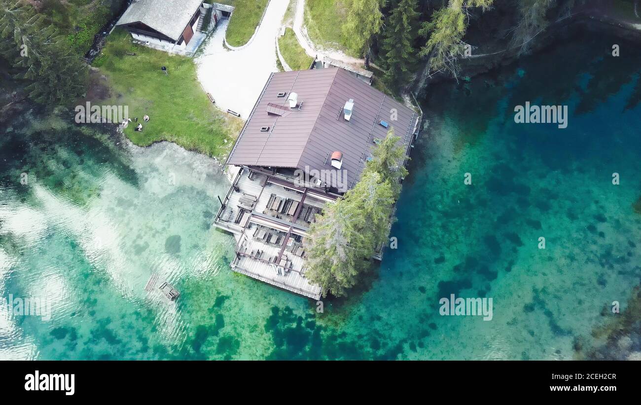 Aerial view of beautiful Chalet along the mountain lake Stock Photo - Alamy