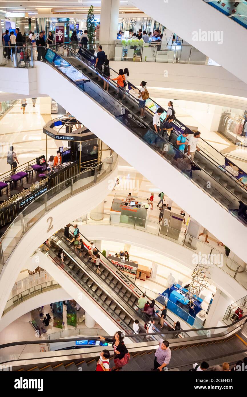 Looking down at the escalators and lower floors of the giant shopping ...