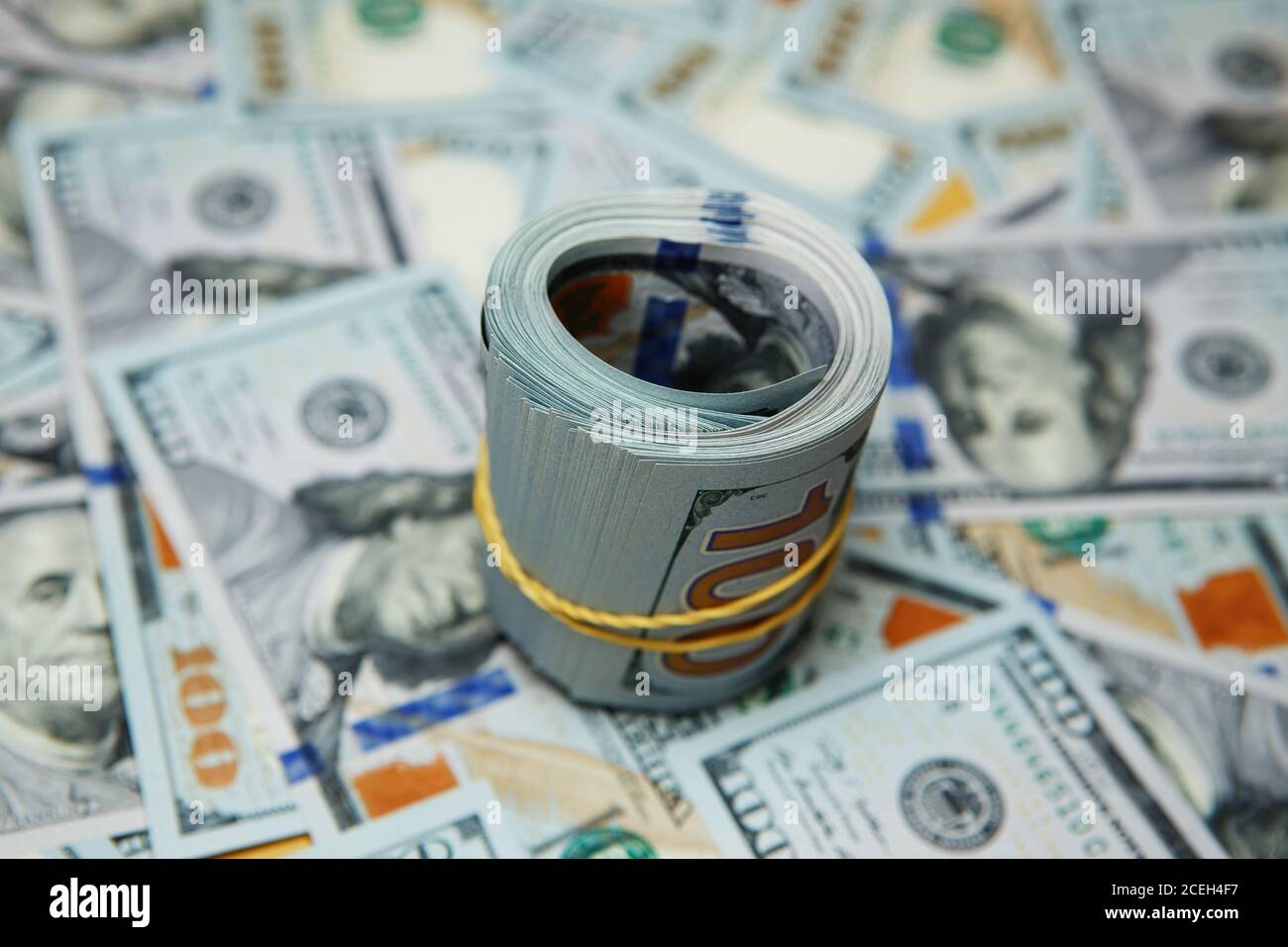 texture spilling hundred dollar bills. dollar roll on background of ...