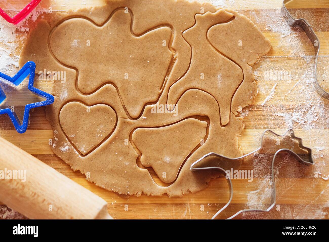 Cooking and decorating christmas gingerbread. Homemade gingerbread ...