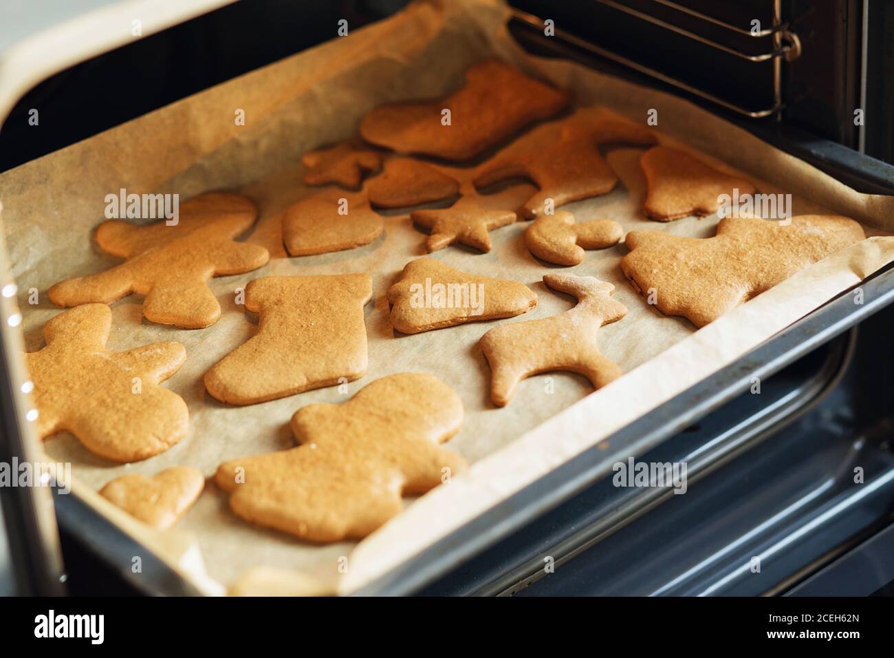Cooking and decorating christmas gingerbread. The process of baking ...