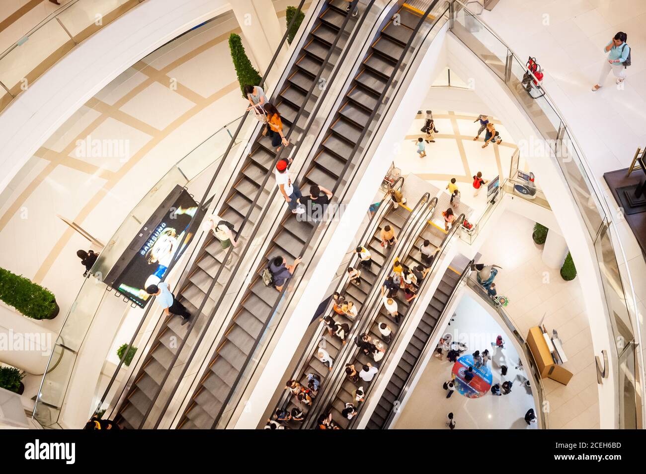 Looking down at the escalators and lower floors of the giant shopping ...