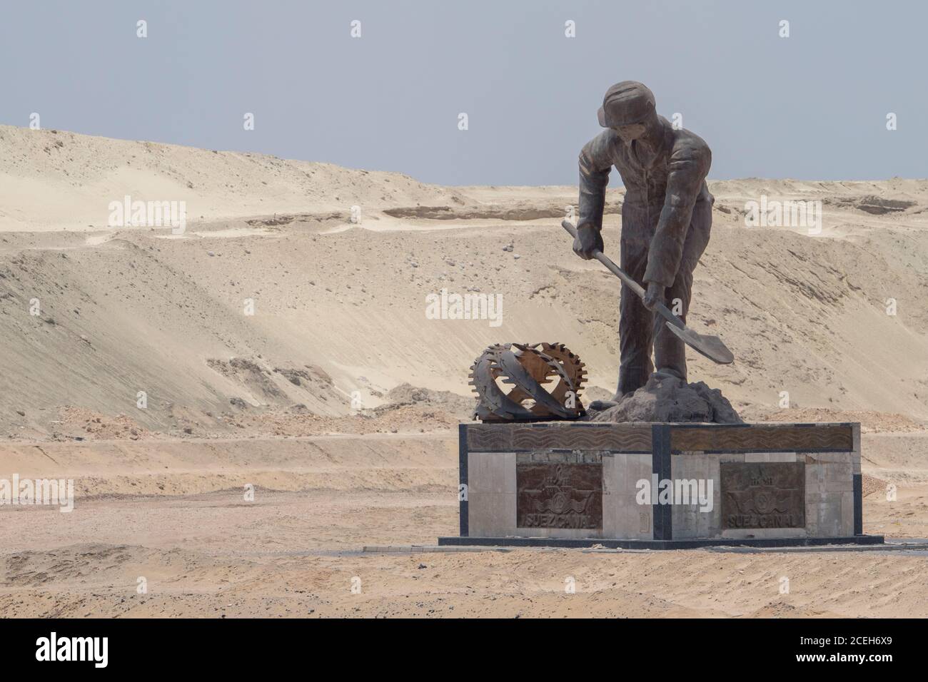 Egypt, Suez Canal, Ismailia. Suez Canal monument of canal worker along ... Egypt, Suez Canal, Ismailia. Suez Canal monument of canal worker along ...