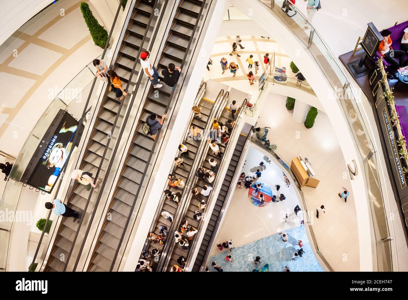 Looking down at the escalators and lower floors of the giant shopping ...