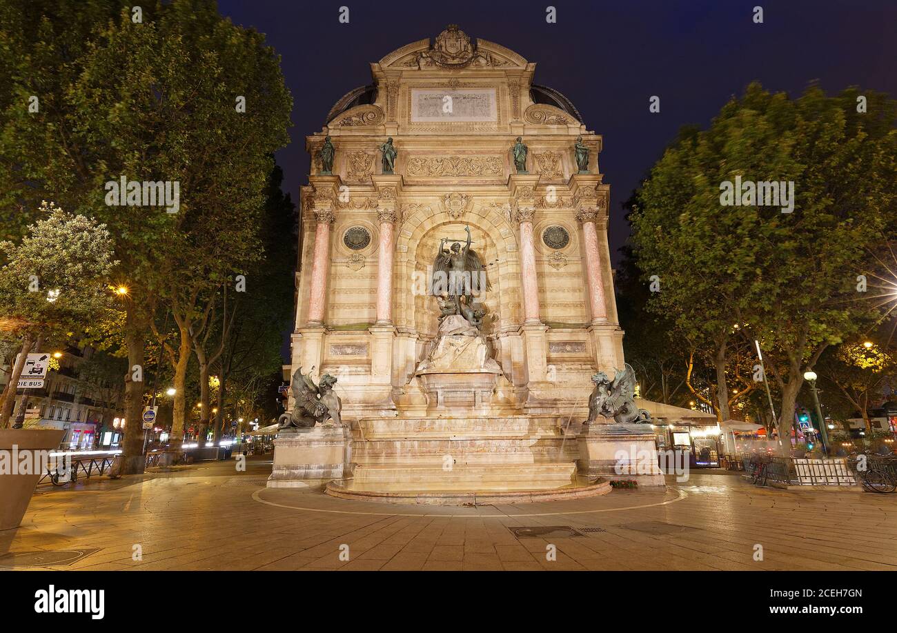 Fountain Saint-Michel at Place Saint-Michel in Paris, France. It was ...