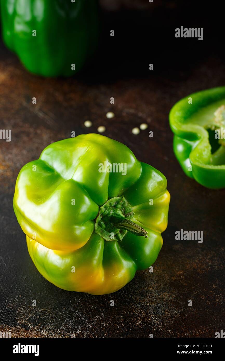 Sweet green pepper on dark background. Fresh yellow green bell pepper ...