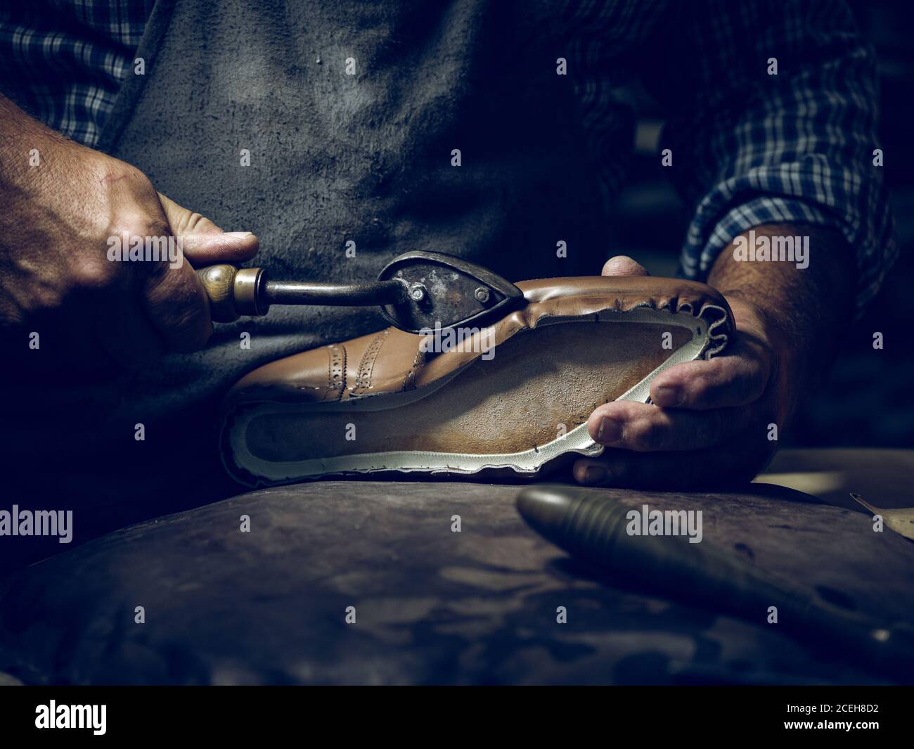 Making shoes hi-res stock photography and images - Alamy