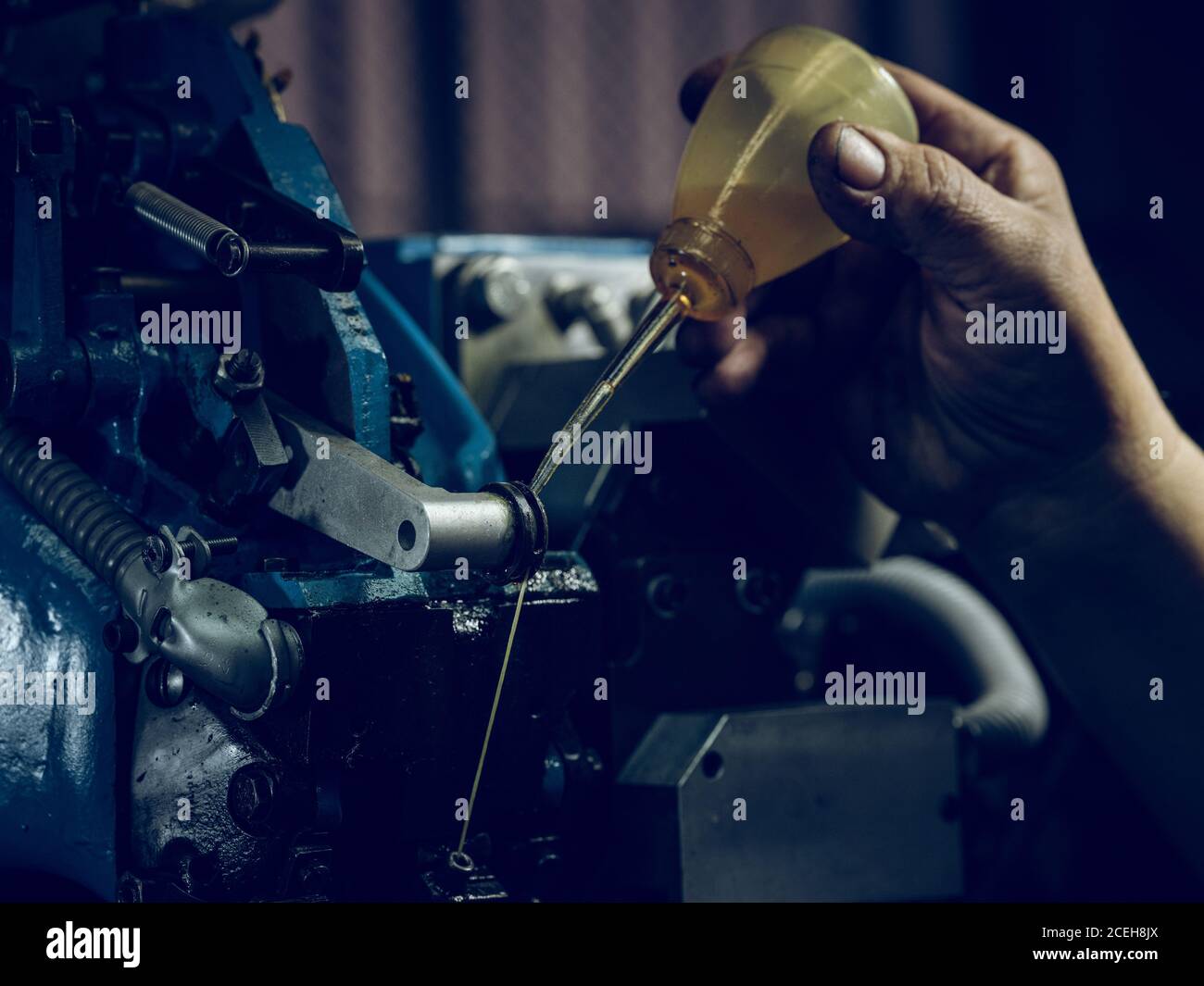 Oiling the machine hi-res stock photography and images - Alamy