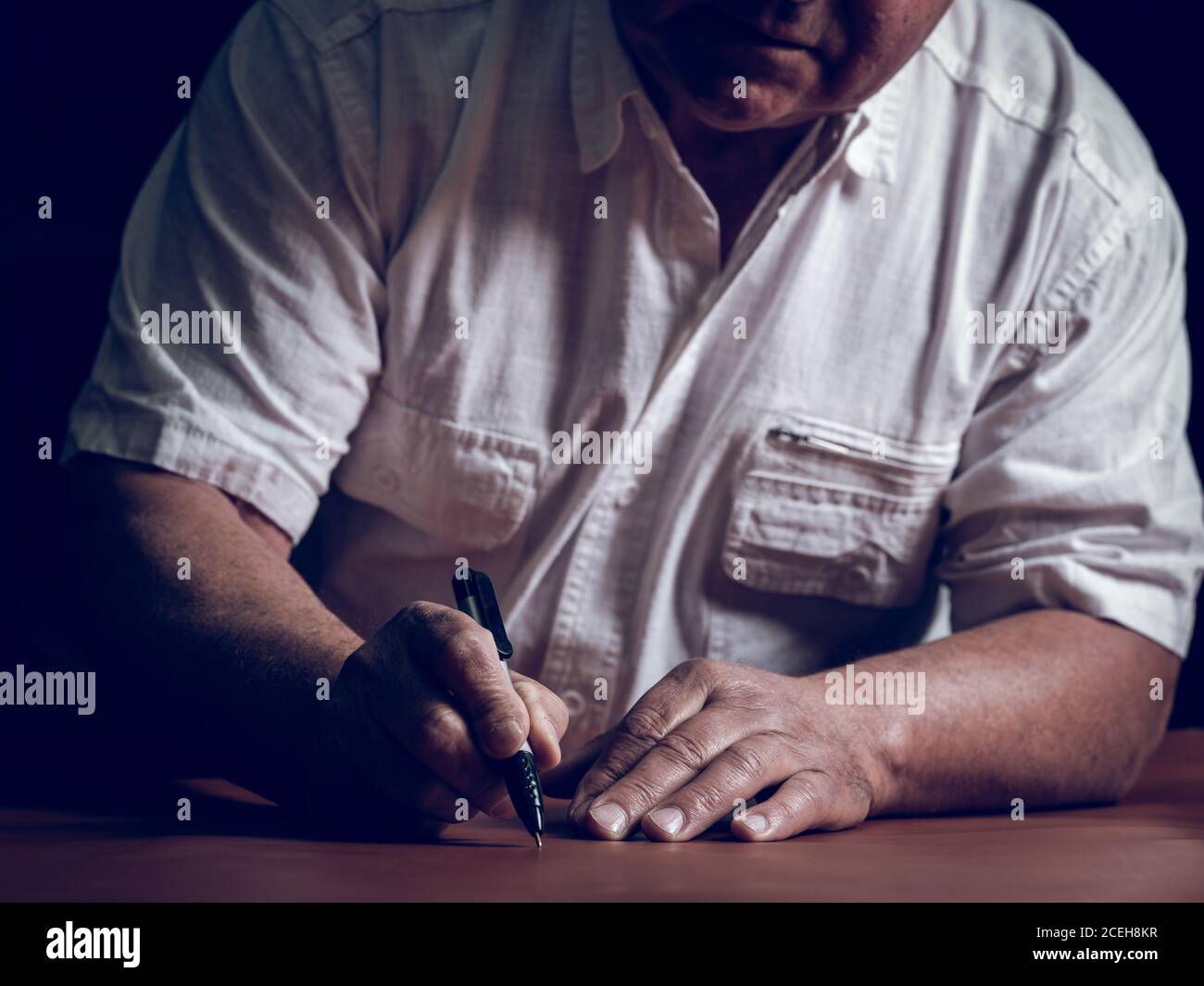 Crop man drafting on leather Stock Photo - Alamy