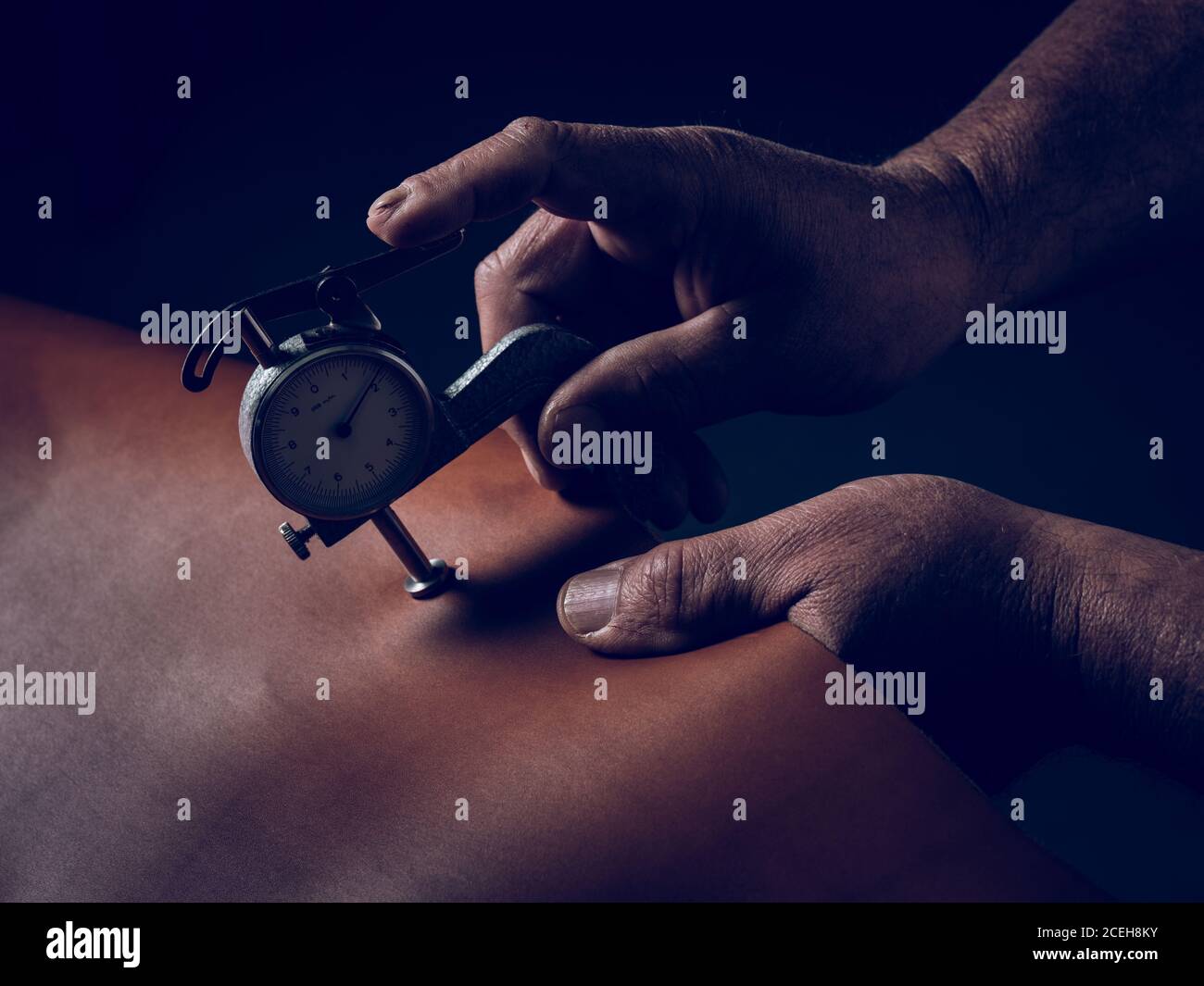 Measuring thickness hi-res stock photography and images - Alamy