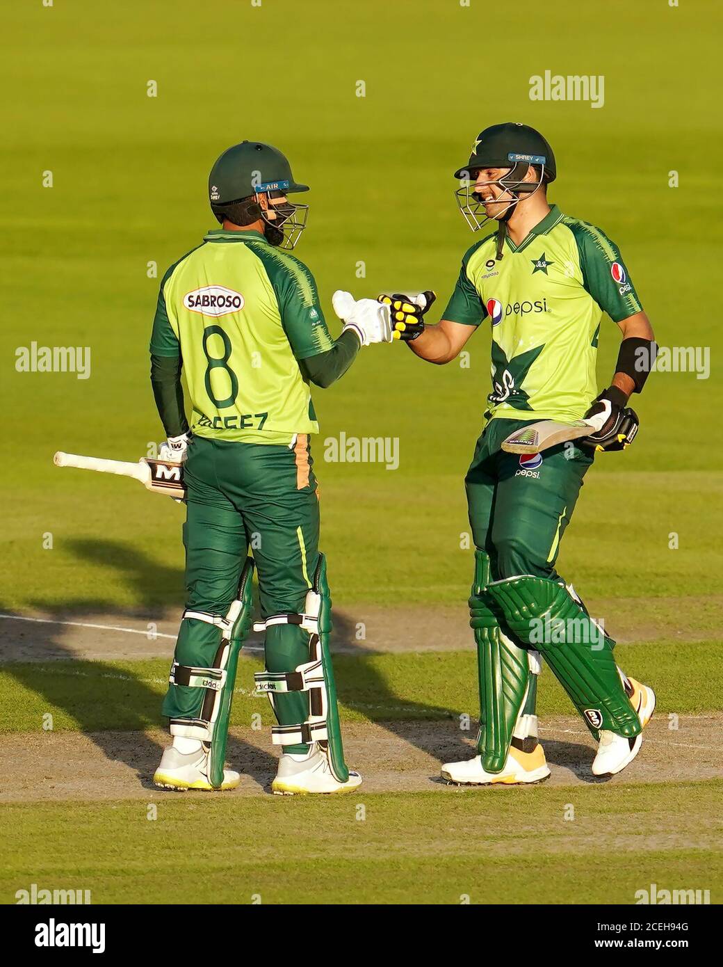 Pakistan's Haider Ali (right) celebrates his half-century celebrate ...