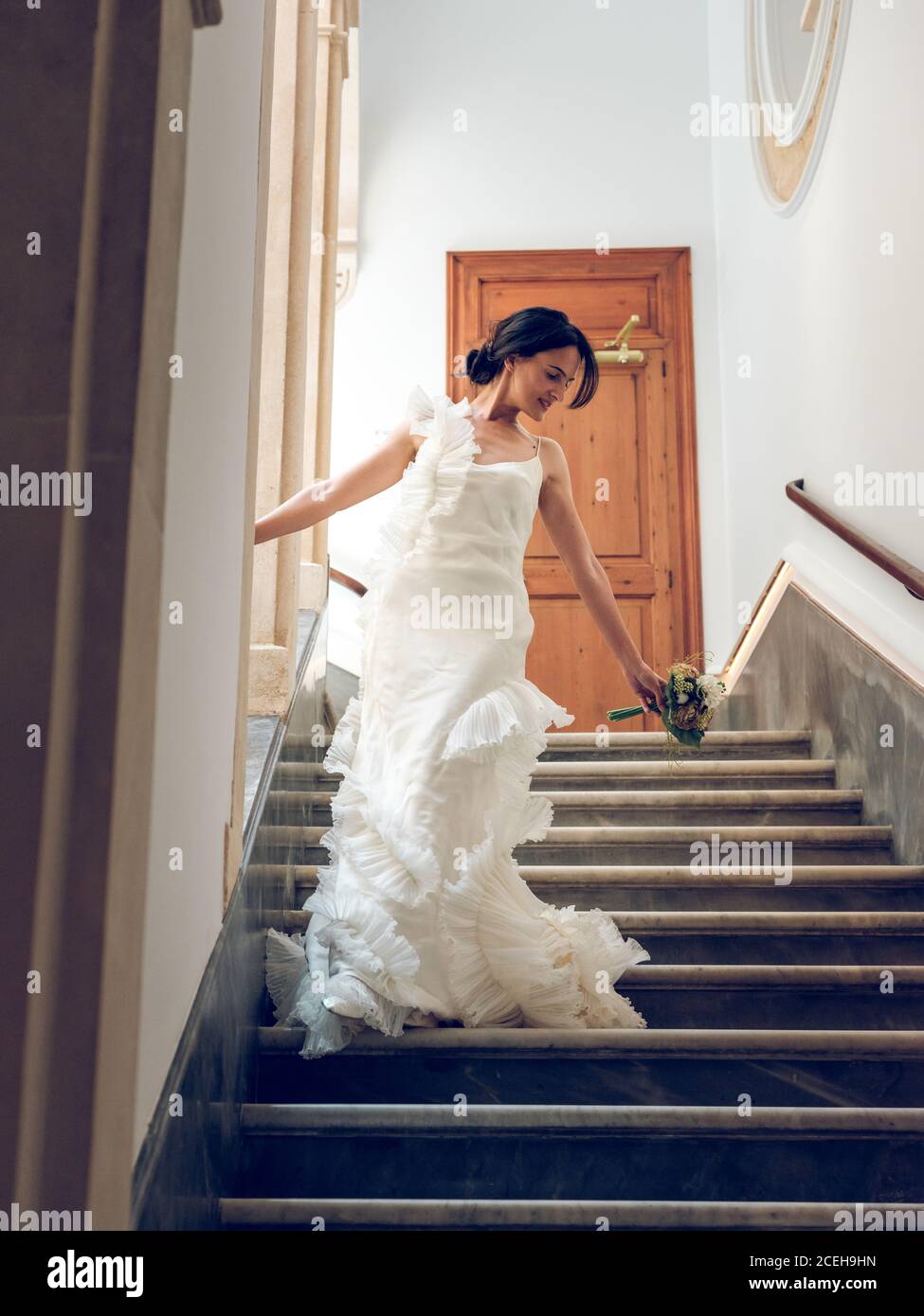Female dress stairs hi-res stock photography and images - Alamy