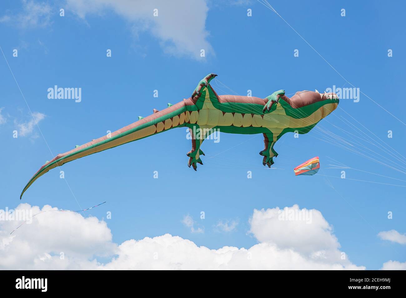 kites flying in a blue sky. Kites of various shapes. kiting Stock Photo ...