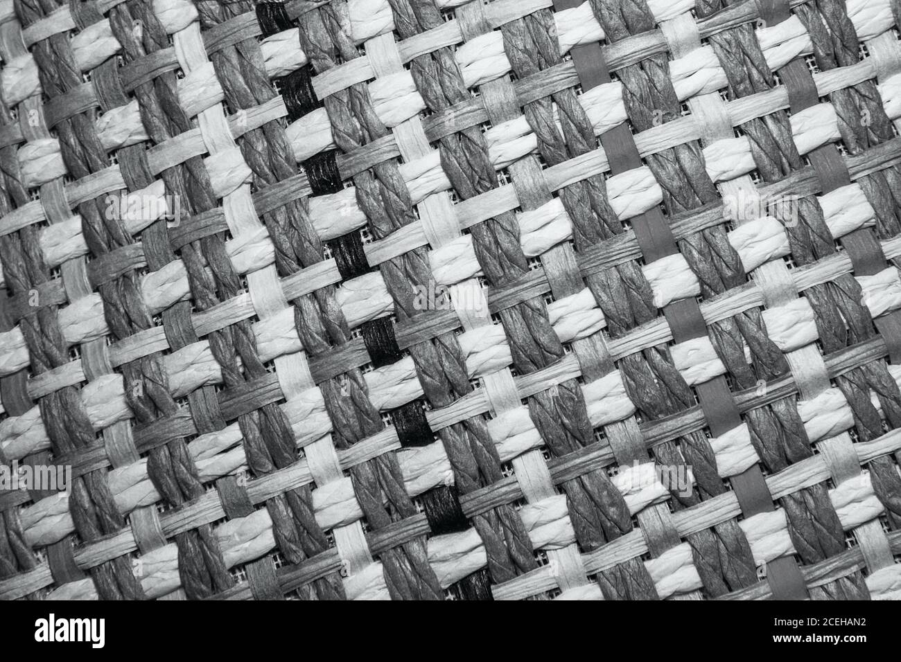 Wicker texture hat with colored fibers. Straw hat texture background ...