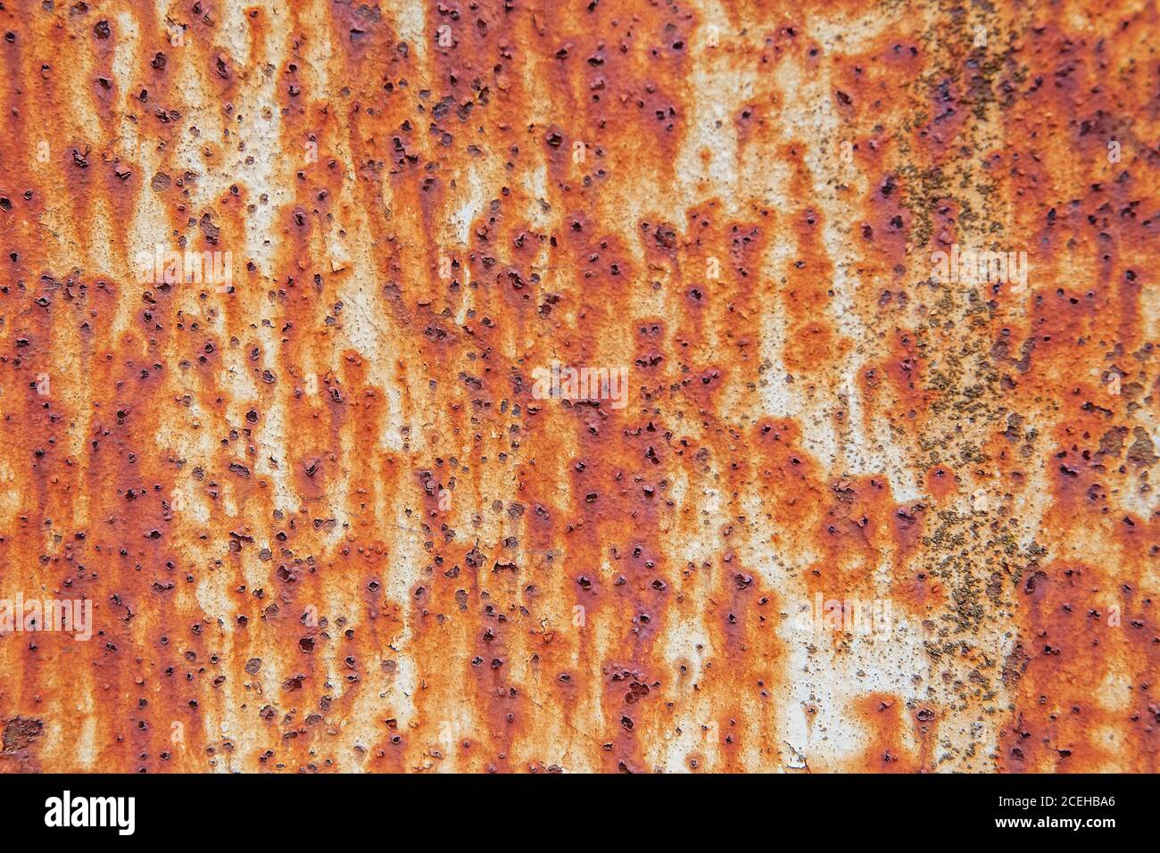 Rusty metal wall background with streaks of rust. Rust stains Stock ...