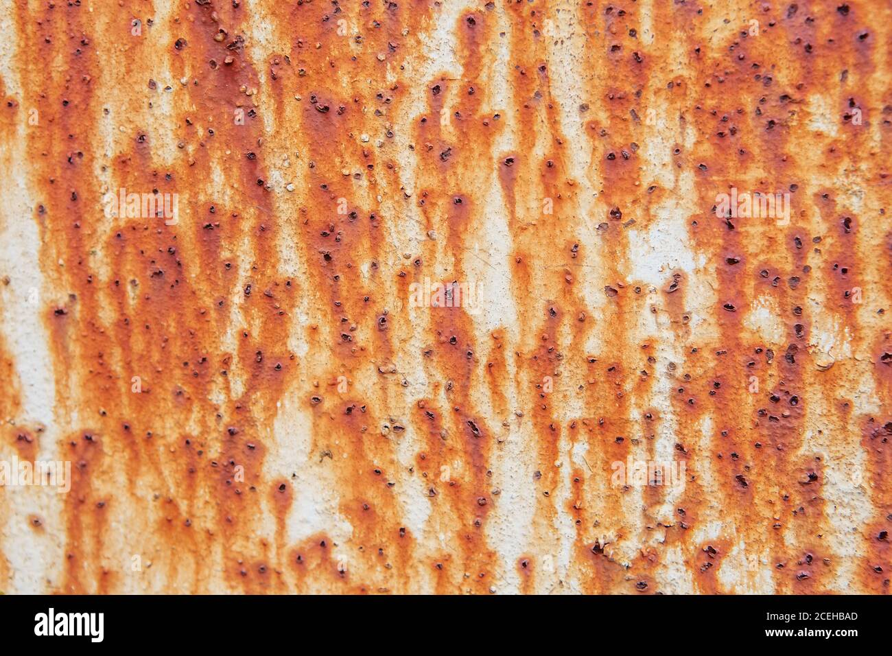 Rusty metal wall background with streaks of rust. Rust stains Stock ...