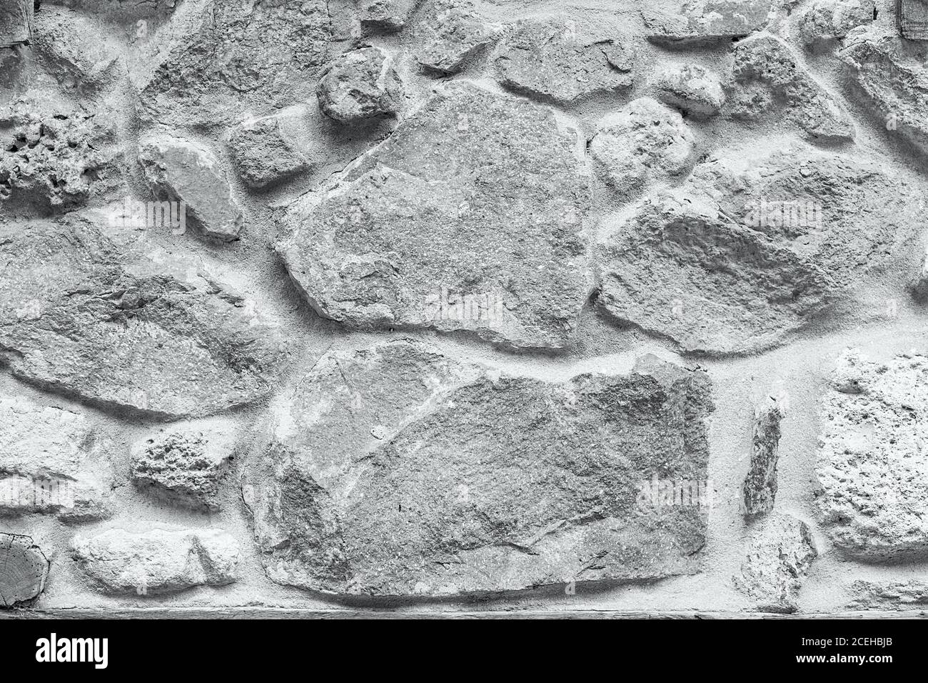 Grey grunge stone wall background texture. Old masonry on the walls of ...