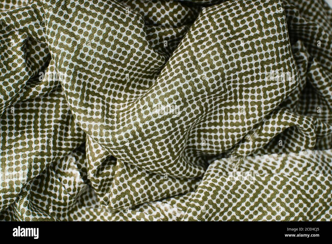 green polka dots fabric texture background Stock Photo - Alamy