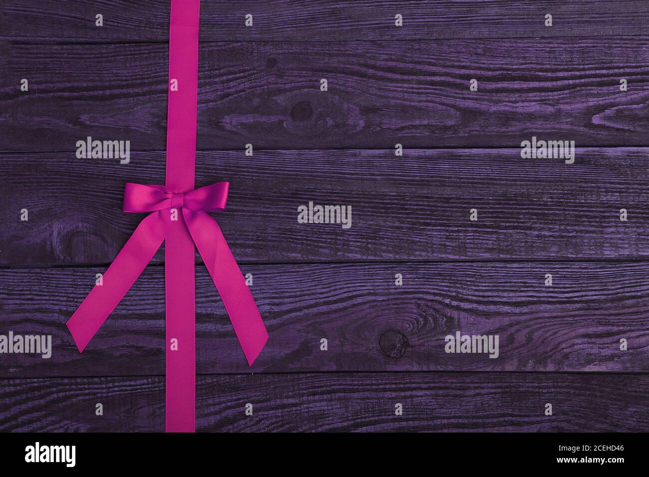 Grunge plank wood texture background with pink ribbon Stock Photo - Alamy