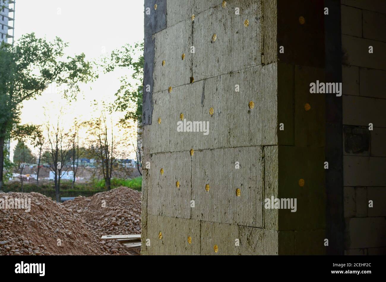 Mineral wool insulation of the facade building on construction site ...
