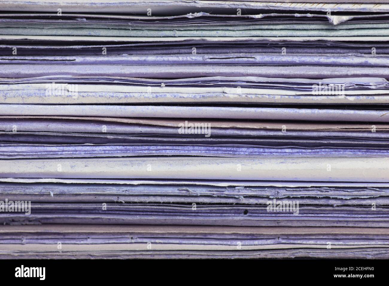 A stack of old dilapidated folders. Old paper texture background Stock ...