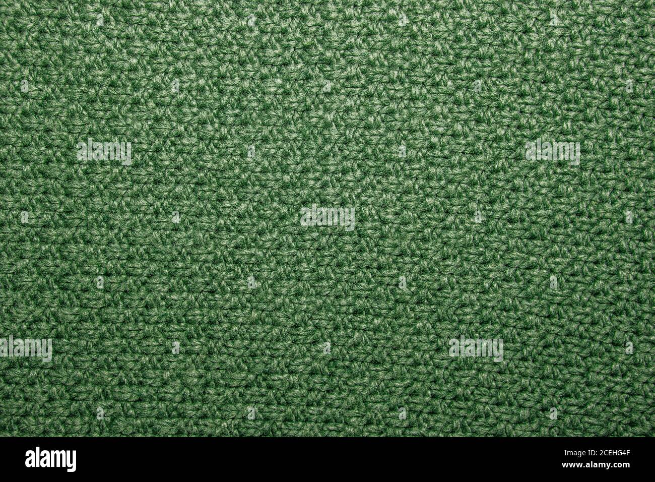Seed stitch in green yarn as an abstract background texture Stock Photo ...