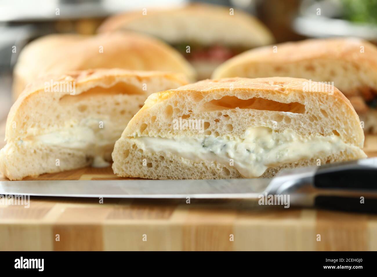 Cutting bread in store hi-res stock photography and images - Alamy