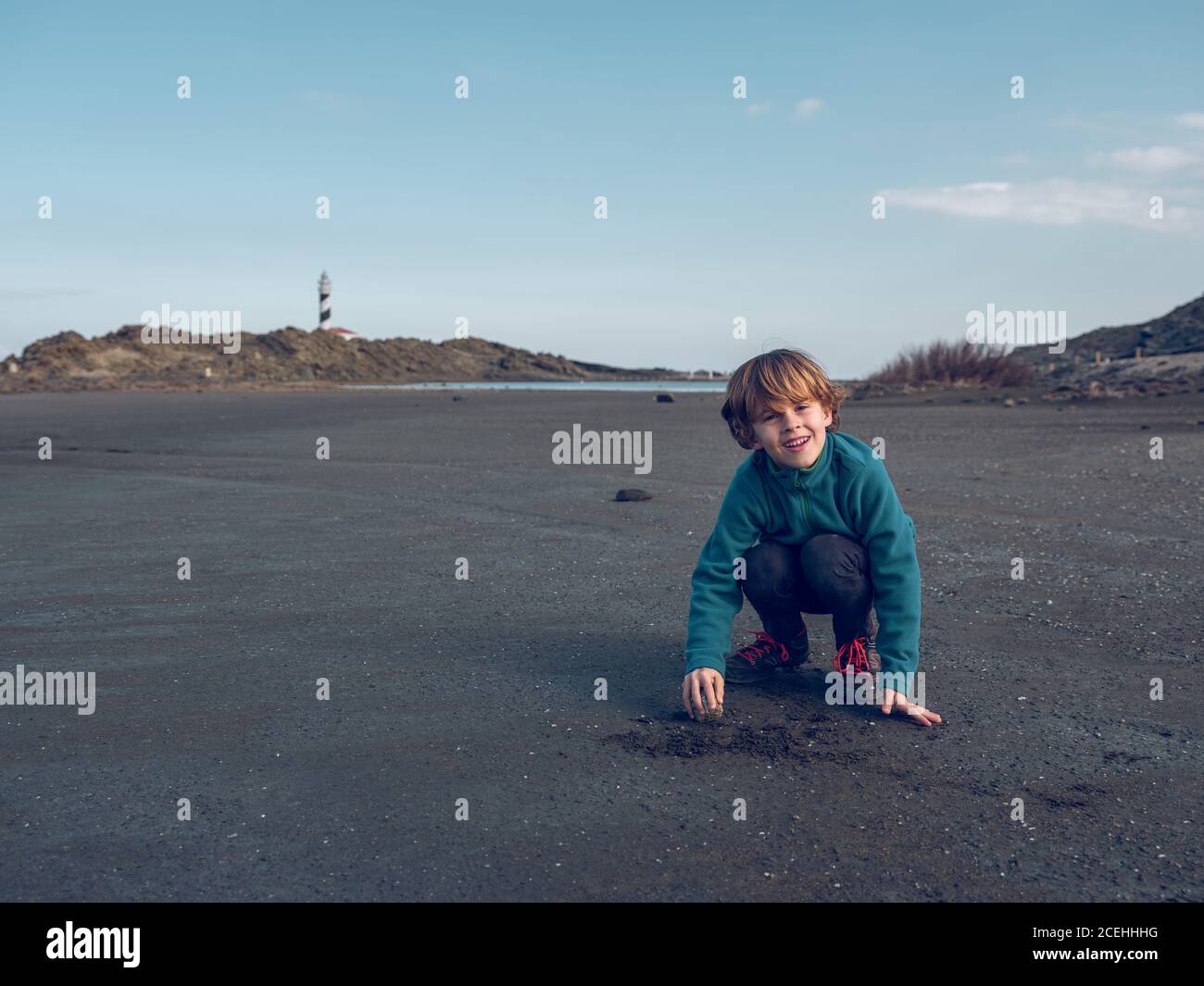 Boy playing sand hi-res stock photography and images - Alamy