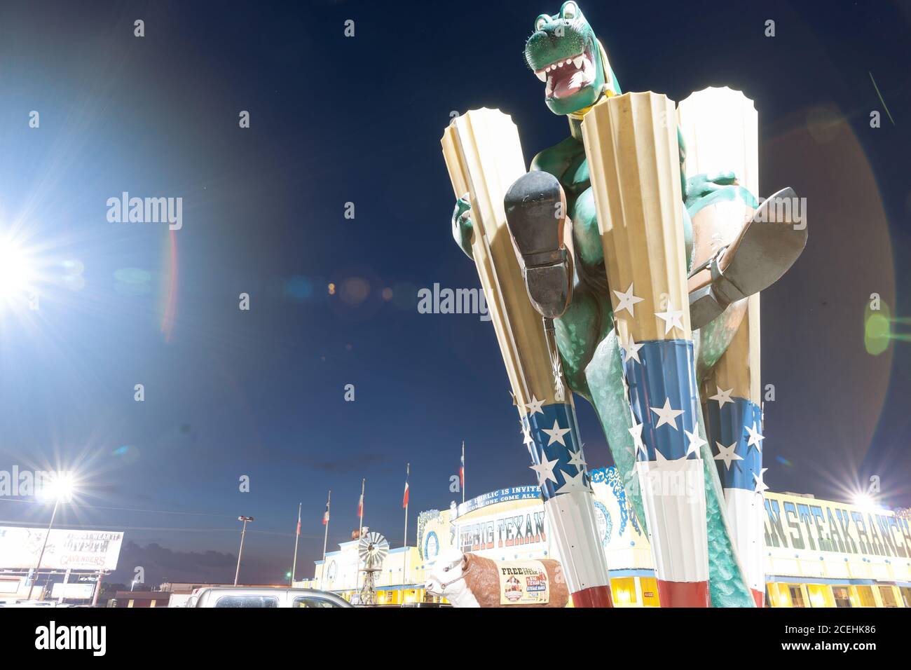Green dinosaur statue outside The Big Texan Steak Ranch, famous ...