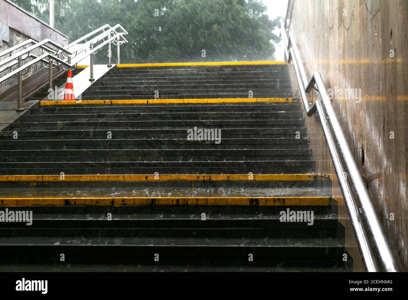 wet steps in the underpass, rain background Stock Photo - Alamy