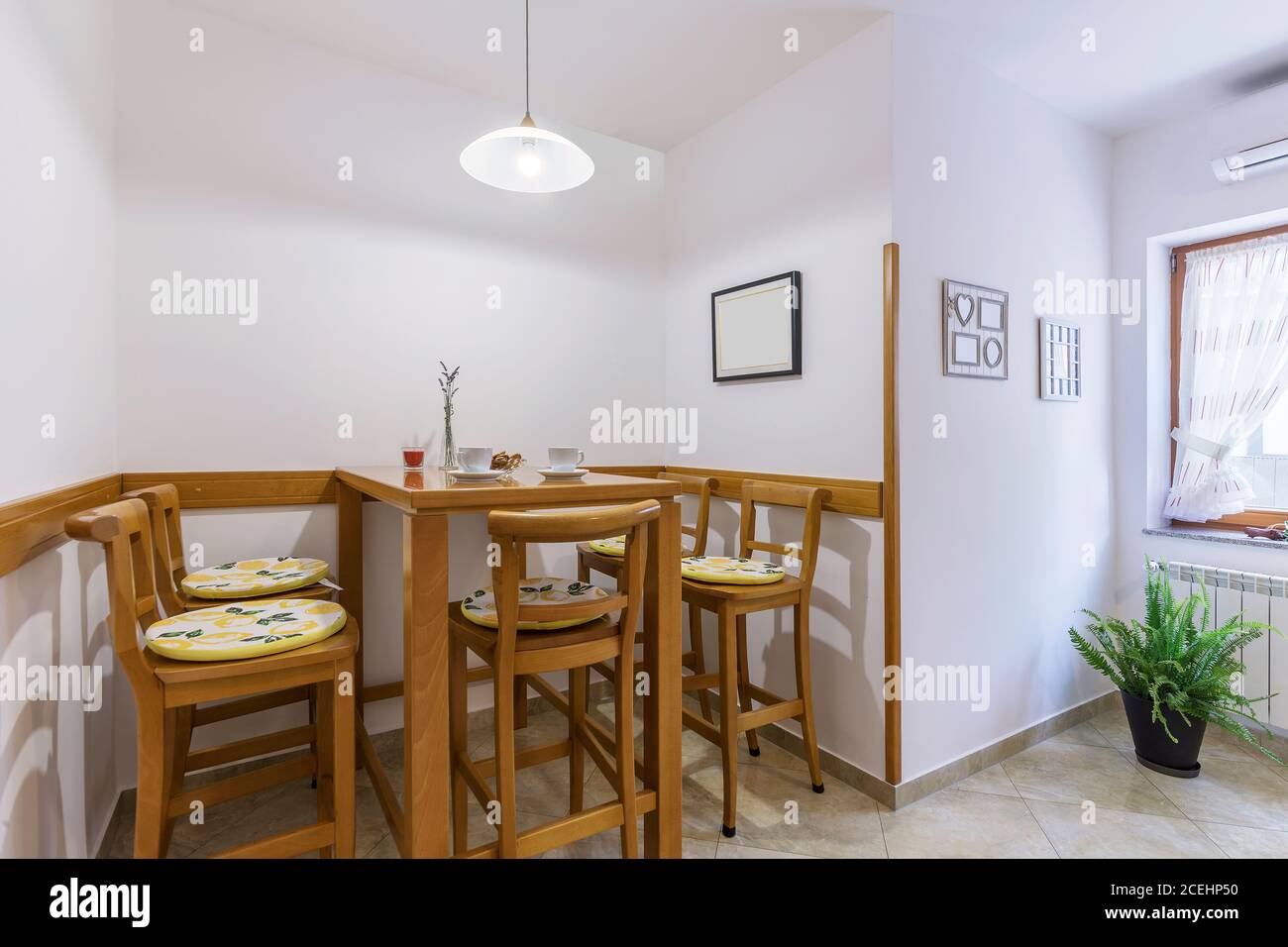 interior detail of corner dining table Stock Photo - Alamy