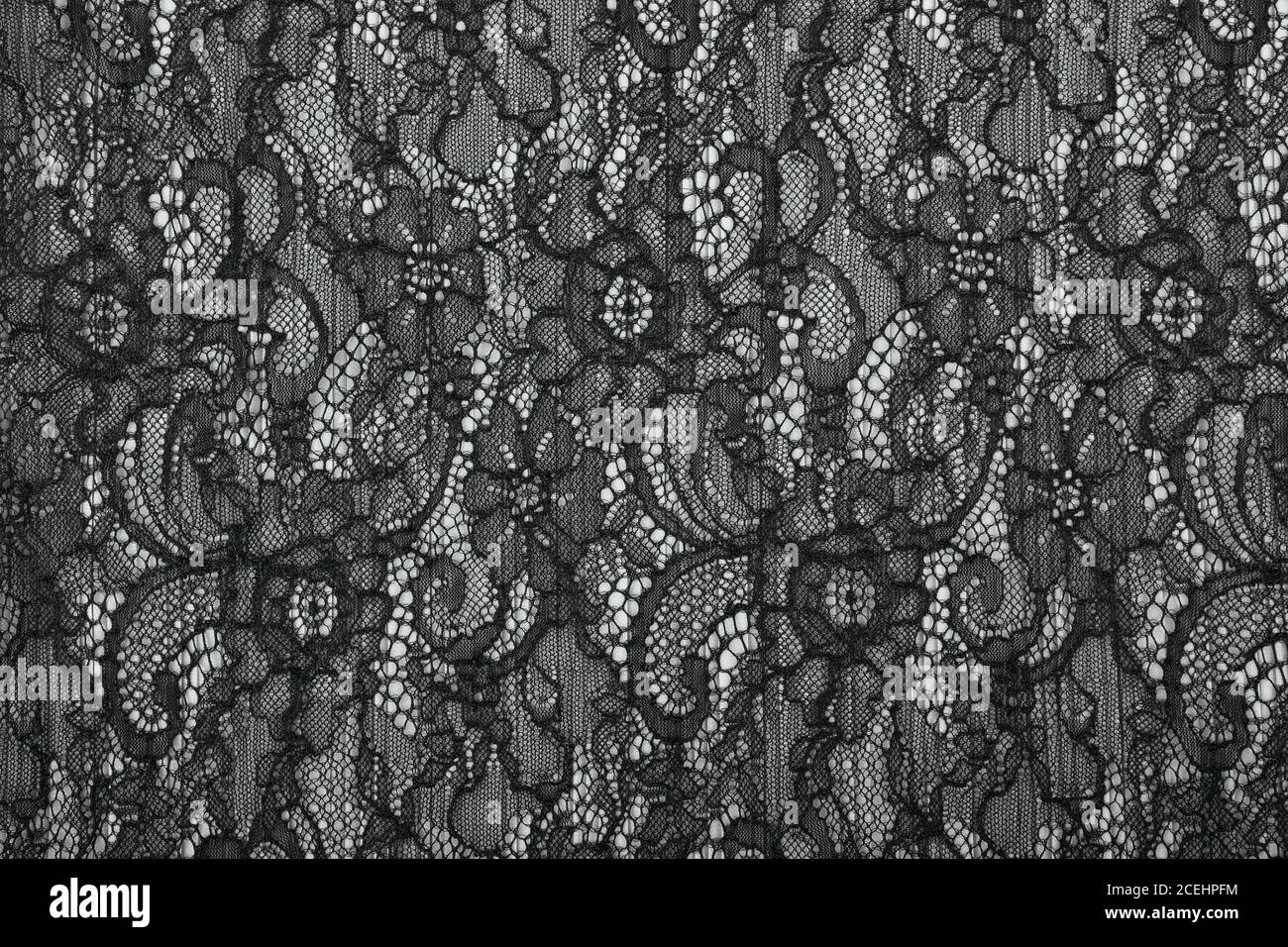 Black openwork lace background texture. Black guipure. Black fabric ...