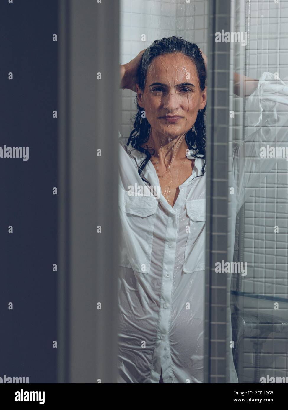 Lady in shower smiling hi-res stock photography and images - Alamy