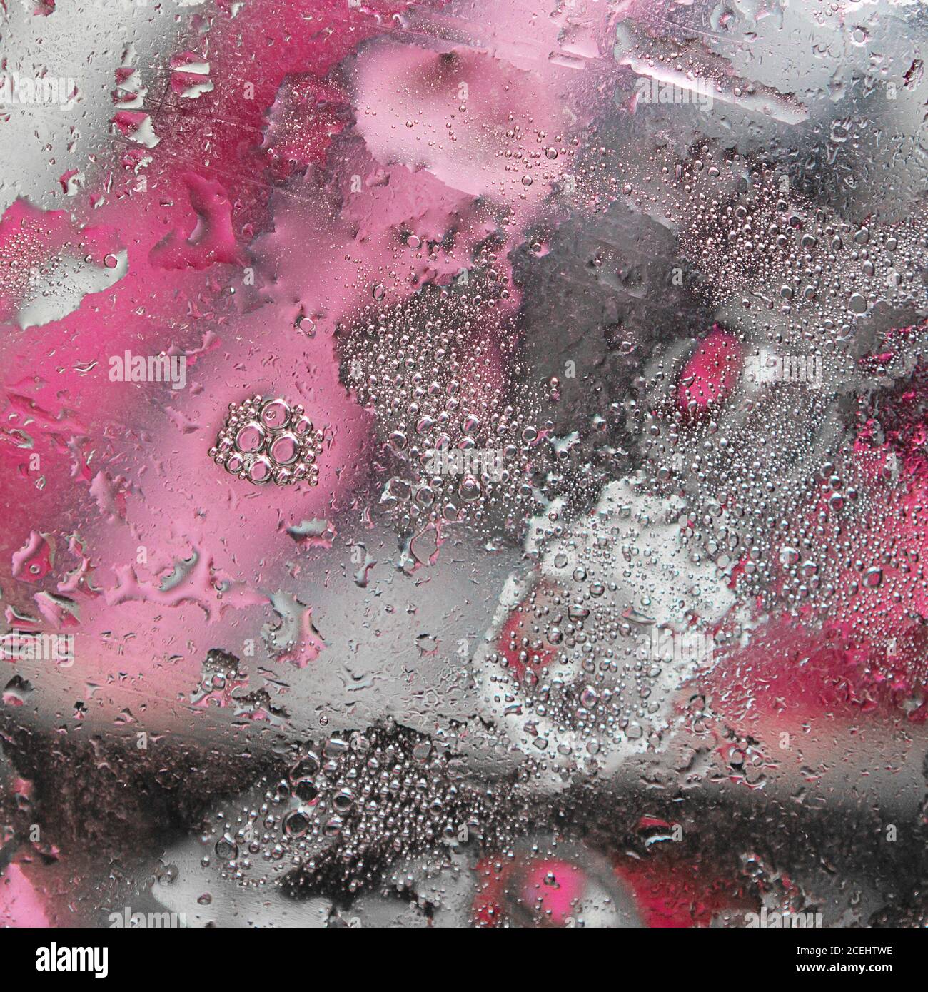 Abstract background of oil mixed with water in different color ...