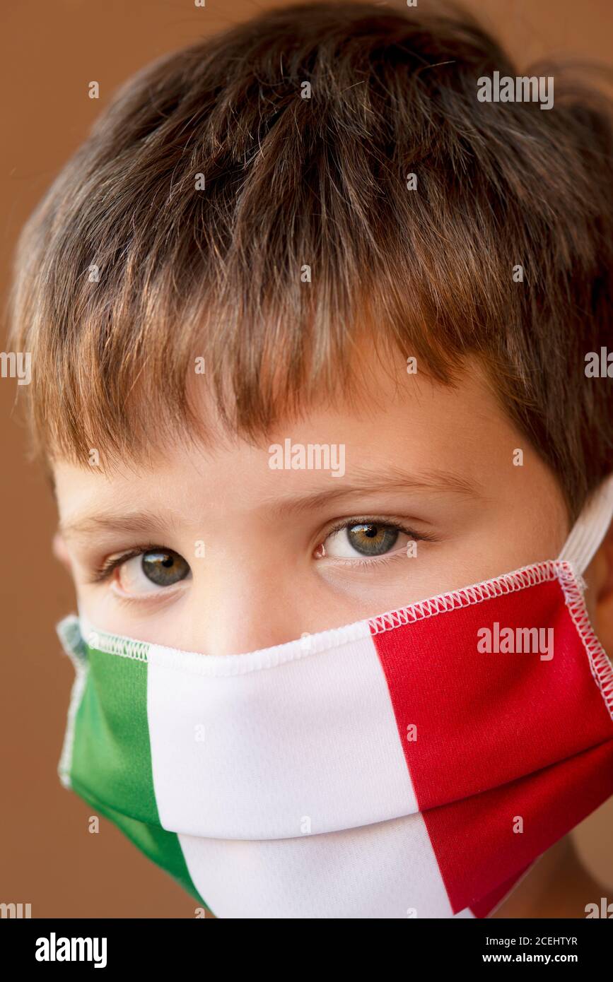 Boy In Surgical Mask With Italian Flag Stock Photo - Alamy